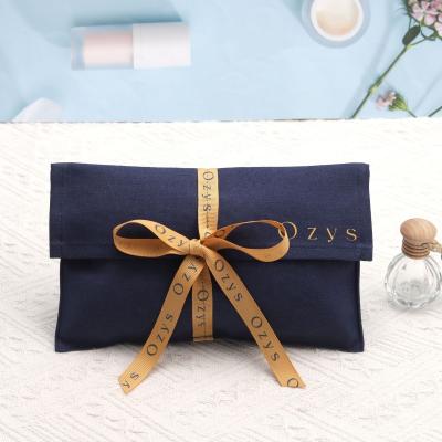 China Cotton Linen Envelope Flap Pouch Dustproof Cosmetic Handbag Packaging 30x20cm for sale