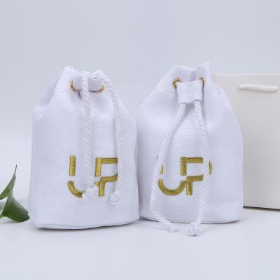 China Custom Embroidery Canvas Drawstring Pouch 4x6 Inch Golf Balls Storage Bag for Cosmetics for sale