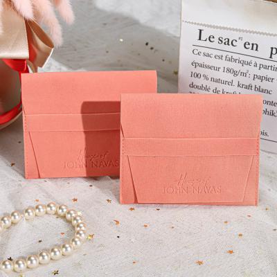 China Orange Velvet Jewelry Pouch 12x10 cm with Emboss Logo Custom Suede Gift Envelope Bag for sale