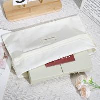 China Custom Organic Muslin Cotton Drawstring Dust Bag 20x30cm with Fabric Label for Cosmetic Underwear Storage for sale