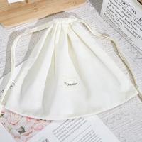 China Custom Organic Muslin Cotton Drawstring Dust Bag 20x30cm with Fabric Label for Cosmetic Underwear Storage for sale