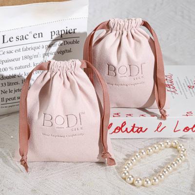 China Luxury Microfiber Jewelry Drawstring Packaging Bag Custom Emboss Logo Microfiber Accessories Gift Drawstring Pouch for sale