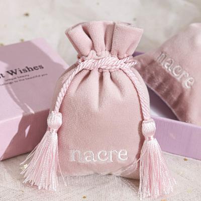 China Pink Velvet Jewelry Drawstring Pouch 10x15cm with Tassel Custom Logo Soft Gift Bag for sale