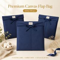 China Custom Dark Blue Cotton Canvas Envelope Pouch With Label Large Canvas Envelope Clothing Pillow Storage Bag With Bow for sale