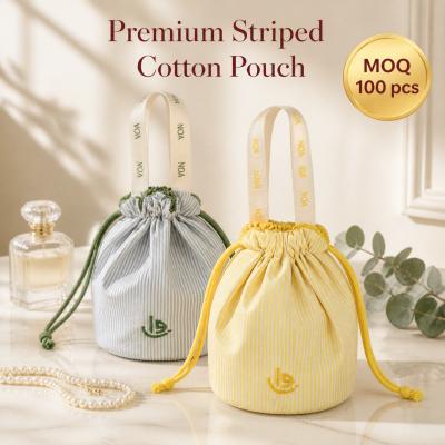 China Custom Vertical Striped Cotton Drawstring Dust Bag With Handle Round Bottom Cotton Candle Wine Packing Drawstring Pouch With Embroidery Logo for sale