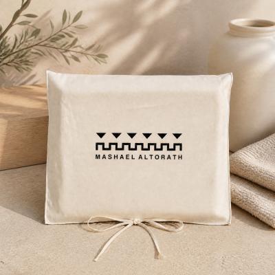 China Custom Logo Natural Muslin Cotton Full Flap Cover Gift Bag with Bow Wholesale Reusable Cotton Apparel Envelope Packaging Pouch for sale