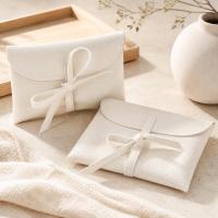 China Personalized Pu Leather Cosmetic Envelope Pouch With Bow High Quality Pu Leather Perfume Jewelry Cover Gift Bag for sale