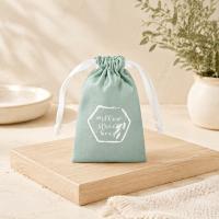 China Custom Logo Cotton Linen Drawstring Gift Pouch with Ribbon Closure Reusable Jewelry Cosmetic Wedding Favor Packaging Bag for sale