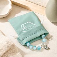 China Custom Logo Cotton Linen Drawstring Gift Pouch with Ribbon Closure Reusable Jewelry Cosmetic Wedding Favor Packaging Bag for sale
