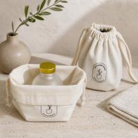 China Eco-friendly Canvas Drawstring Plant Packing Bag with square Bottom Custom Natural Cotton Canvas Drawstring Candle Dust Pouch for sale
