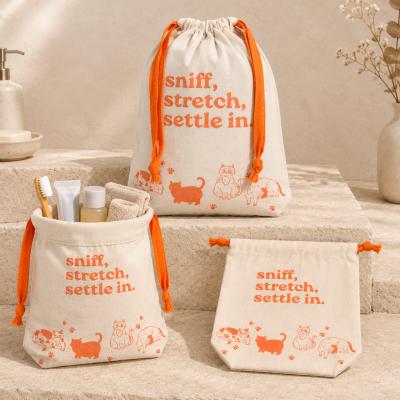 China Custom Printed Canvas Drawstring Backpack for Cat Lovers Pet Toys Daily Essentials Travel Storage Reusable Gift Packaging Bag for sale