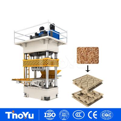 China Waste Kraft Paper Pressed Double Wood Pallet Machine for sale