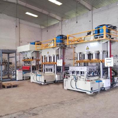 China Waste Kraft Paper Pressed Wood Pallet Machine With Double Moulds for sale