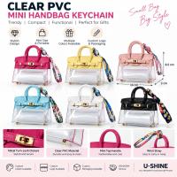 China Custom Clear PVC Mini Handbag Keychain with Wrist Strap for sale