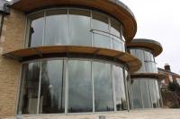 China Hotel Curved Clear Tempered Glass Panels for Shopping Mall Building 3mm-12mm Thickness for sale