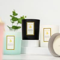 China Customized Logo Glass Jar Scented Candle Colored Soy Based Scented Candles for sale