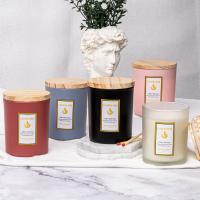 China Customized Logo Glass Jar Scented Candle Colored Soy Based Scented Candles for sale