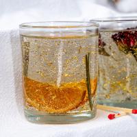 China Decorative Dried Flower Candles And Gel Wax Glass Jar Scented Candle for sale