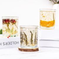 China Decorative Dried Flower Candles And Gel Wax Glass Jar Scented Candle for sale