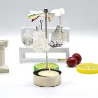 China Metal Candle Holders Christmas Snowflake Tealight Holders Spinning Rotating Candlestick for sale