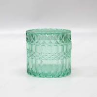 China Transperant Glass Jar Candle Vessel Luxury Embossed Candle Jar With Lid for sale