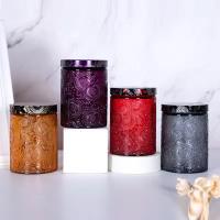 China 8.5cm X 12cm 500ml Empty Straight Round Embossed Glass Candle Jars With Screw Colorful Metal Lid for sale