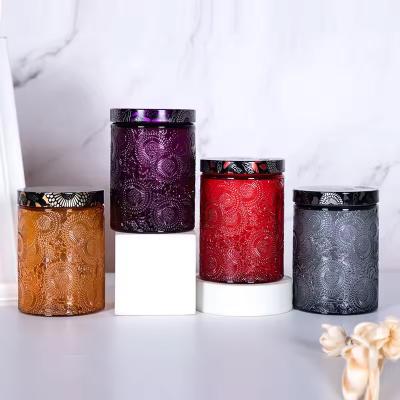 China 8.5cm X 12cm 500ml Empty Straight Round Embossed Glass Candle Jars With Screw Colorful Metal Lid for sale