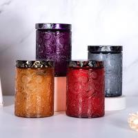 China 8.5cm X 12cm 500ml Empty Straight Round Embossed Glass Candle Jars With Screw Colorful Metal Lid for sale