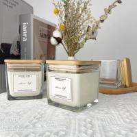 China Scented Empty Glass Candle Jars With Custom Lid Applique Glossy Square Glass Bottle for sale