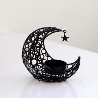 China Creative Rotating Metal Glass Tealight Candle Holder Aromatherapy Ornament Candlestick for sale
