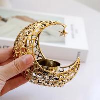 China Creative Rotating Metal Glass Tealight Candle Holder Aromatherapy Ornament Candlestick for sale