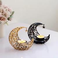 China Creative Rotating Metal Glass Tealight Candle Holder Aromatherapy Ornament Candlestick for sale