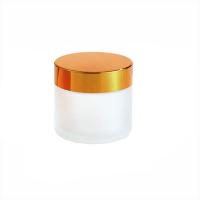 China 2oz Child Resistant Frosted Clear Glass Jar with Gold Lid for sale