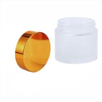 China 2oz Child Resistant Frosted Clear Glass Jar with Gold Lid for sale