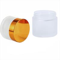 China 2oz Child Resistant Frosted Clear Glass Jar with Gold Lid for sale
