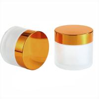 China 2oz Child Resistant Frosted Clear Glass Jar with Gold Lid for sale