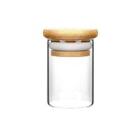 China Wood Lid Suction Borosilicate Glass Jar Marijuana Storage Container 4oz 6oz for sale