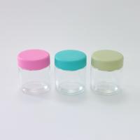 China Smooth Round Glass Weed Flower Candy Storage Container With Child Resistant Screw Cap for sale