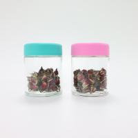 China 2oz 3oz Custom Logo Glass Weed Holder Jar With Child Resistant Screw Cap for sale