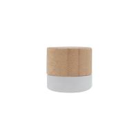China Essential Oil Screw Cap Dab Jar Child Resistant Bamboo Lid Jar 3ml 5ml for sale