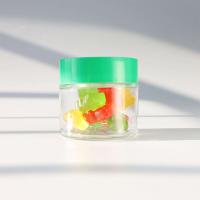 China Smooth Round Glass Weed Flower Candy Storage Container With Child Resistant Screw Cap for sale