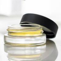 China 7ml Low Profile Thick Cosmetic Glass Jars with Black Lids for Concentrate Oil Lip Balm Cream for sale