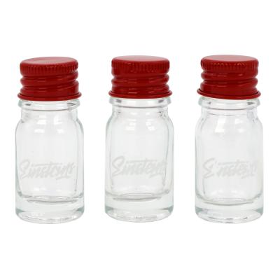 China Leakfree Mini Clear Glass Bottle with Metal Lid for Liquid Oil Cosmetics for sale
