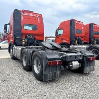 China Used HOWO T7H 440HP 6X4 Tractor Truck for Sale Red Trailer Head for sale