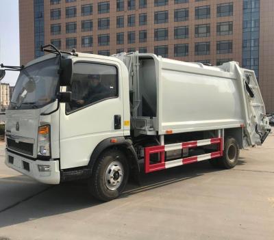 China Used SINOTRUK HOWO 4x2 Compression Garbage Truck 4325mm Wheelbase EURO3 for sale