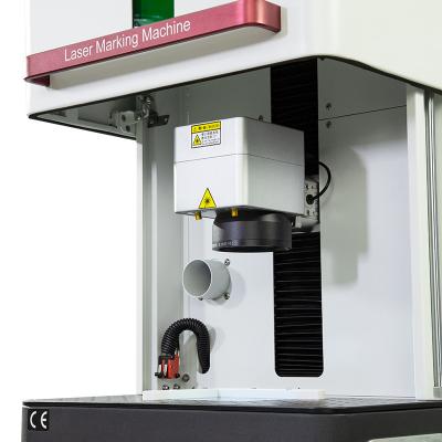China Mini Fiber Laser Marking Machine 20W 30W 50W 100W Enclosed Portable Engraver for Metal for sale