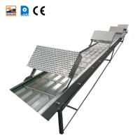 China Stainless Steel Automatic Marshalling Cooling Conveyor Accessories for Cone Production Line 380V for sale