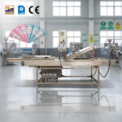 China Automatic Cone Sleeving Device Stainless Steel 220V for Ice Cream Production Line for sale