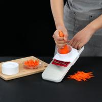China Manual Household Hand Held Vegetable Mandoline Slicer With Stainless Steel Blades for sale