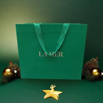 China Custom Logo Luxury White Paper Shopping Bag 5000pcs MOQ Recyclable Ivory Board for sale